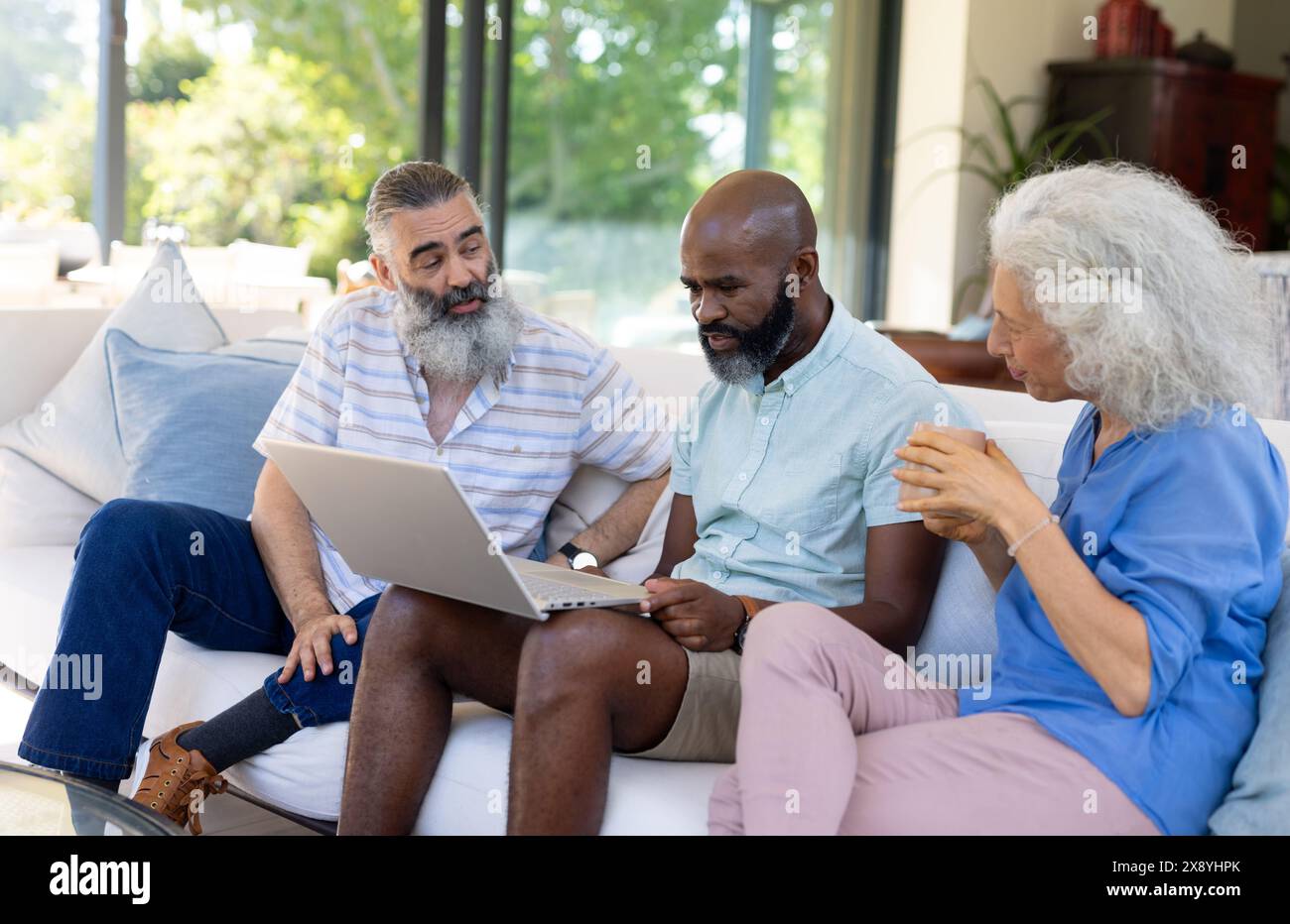 Diverse family sitting around hi-res stock photography and images - Alamy