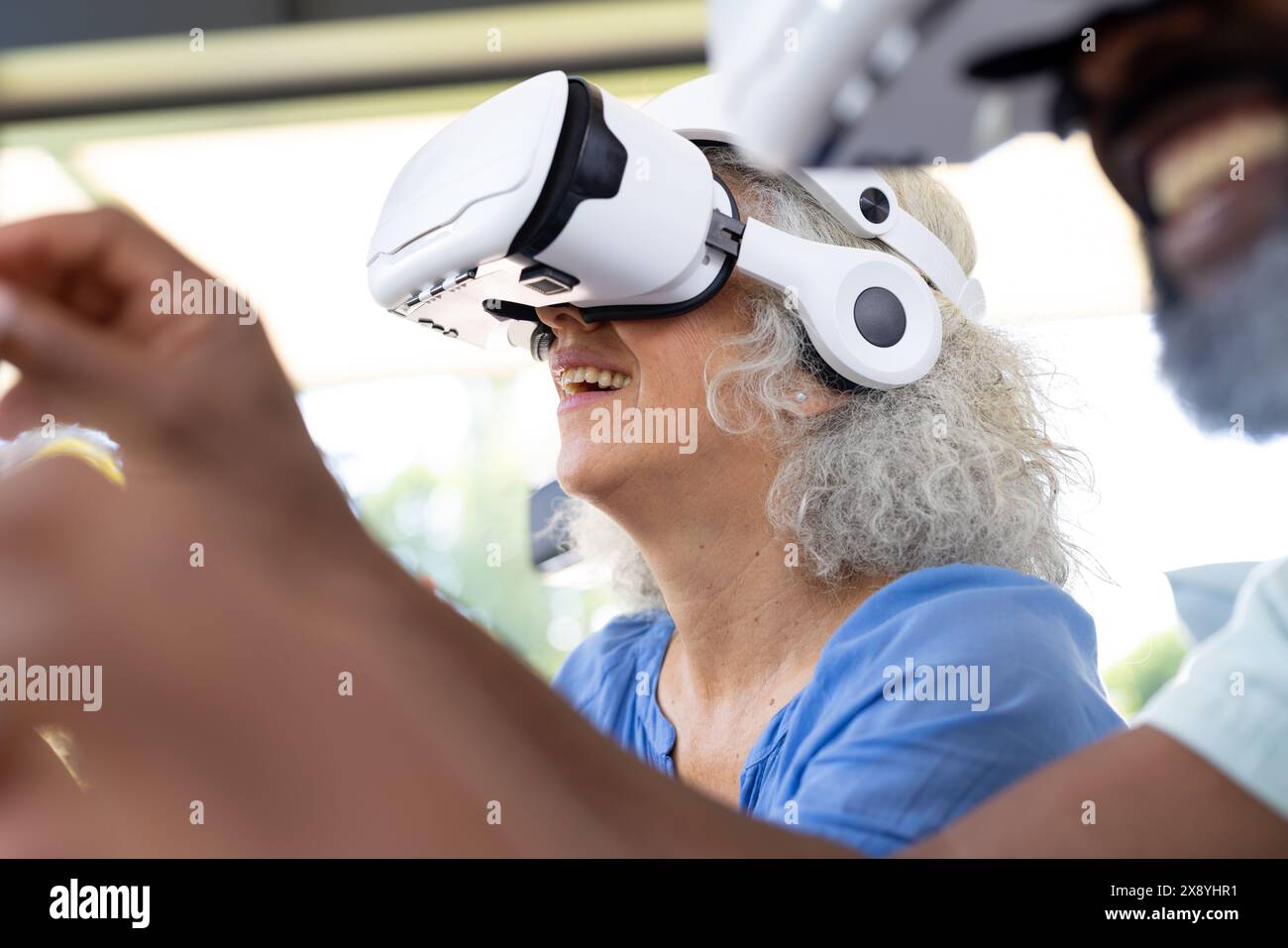 At home, diverse senior friends exploring virtual reality Stock Photo ...