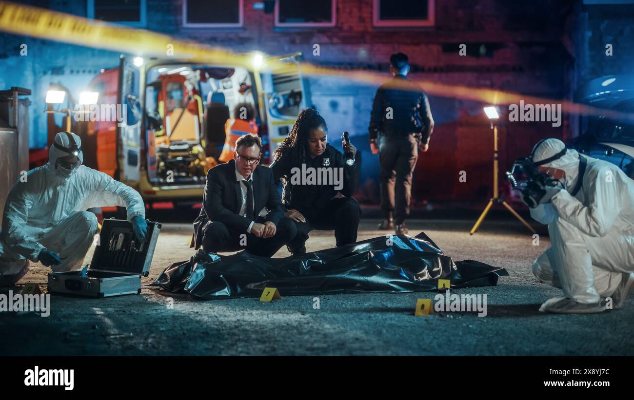 Law enforcement investigators work hi-res stock photography and images ...