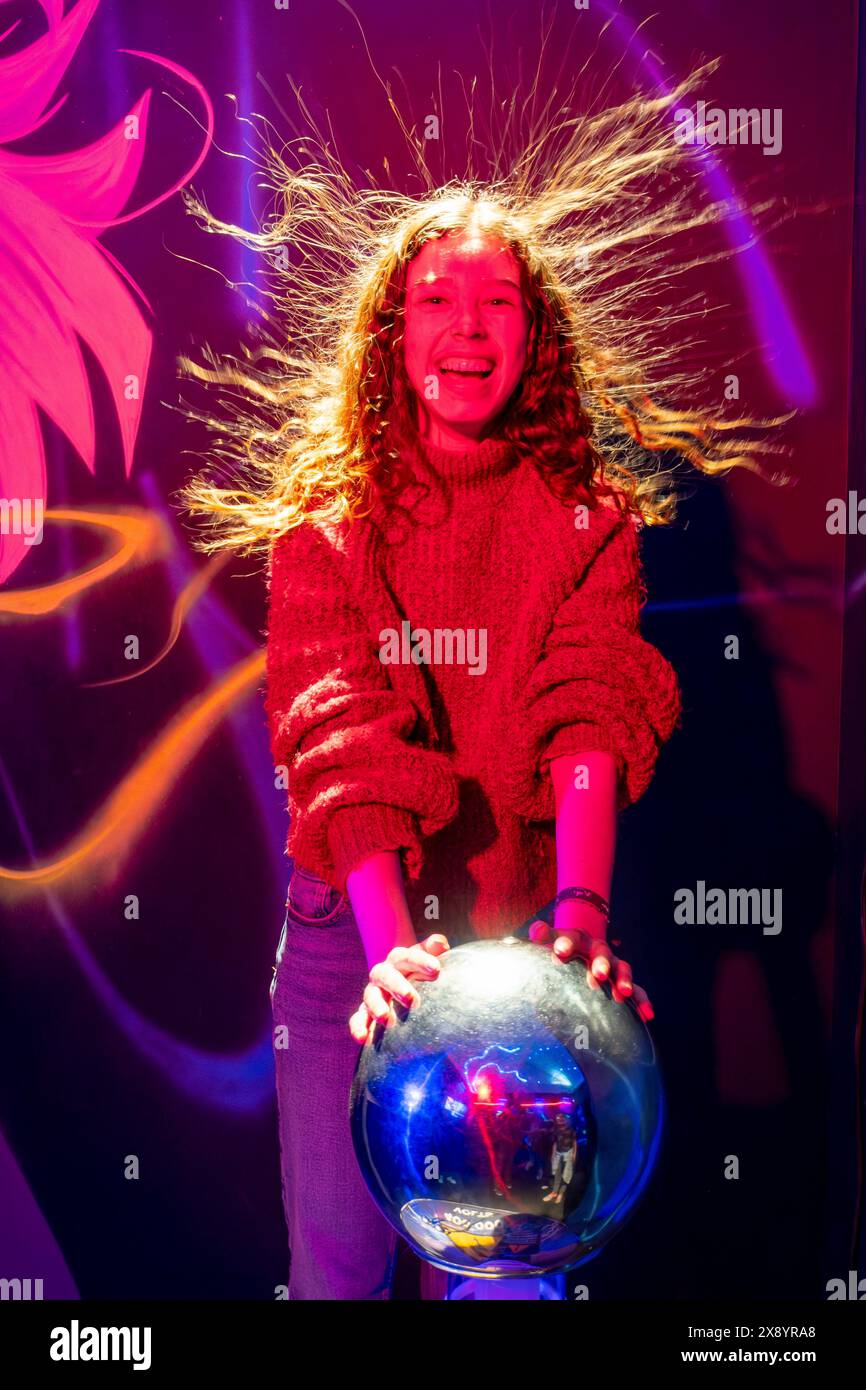 France, Paris, Science Experiments museum, electricity experiment, hair ...