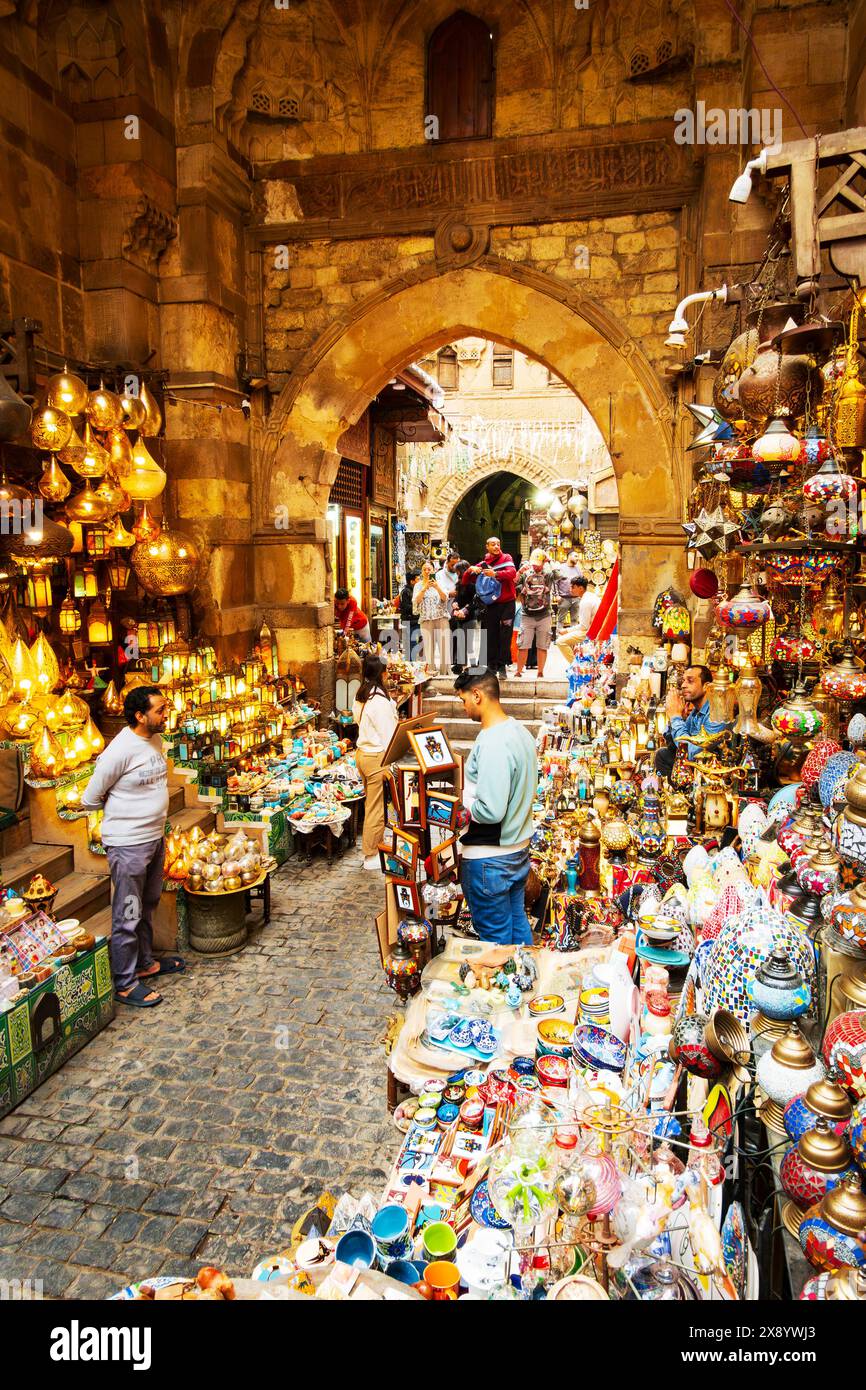 Tourists shop in the ancient historic Khan al Khalili market souk ...