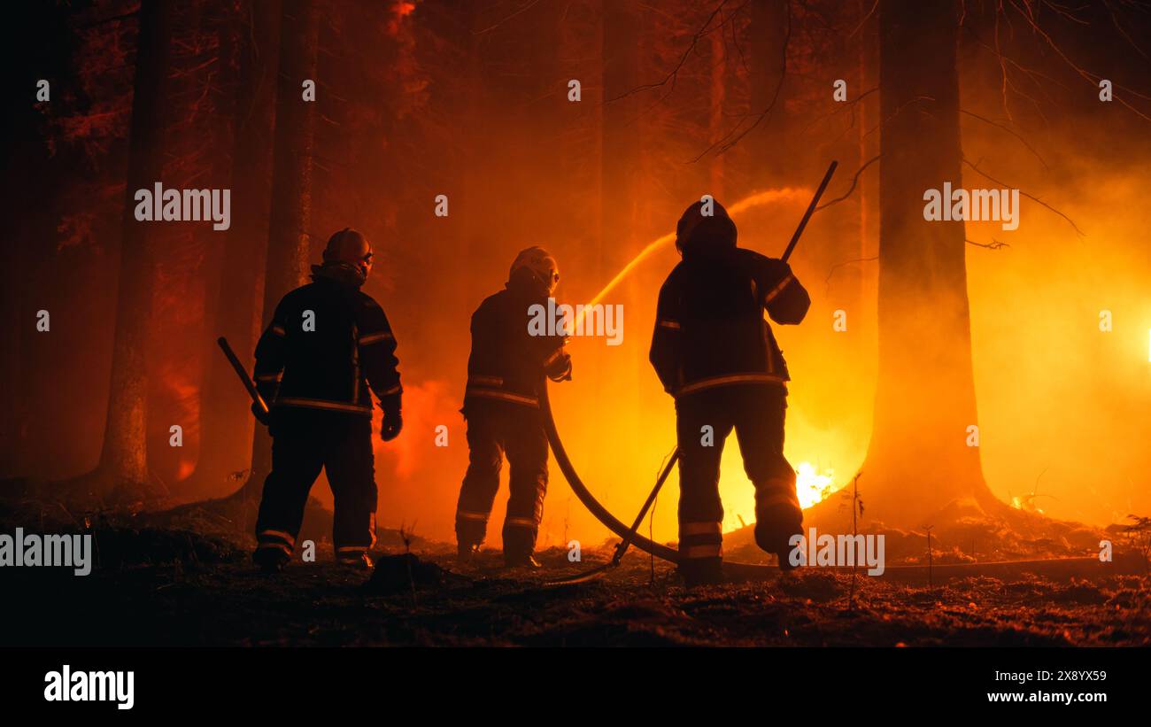 Shot From The Back of a Professional Firefighters Steadily ...
