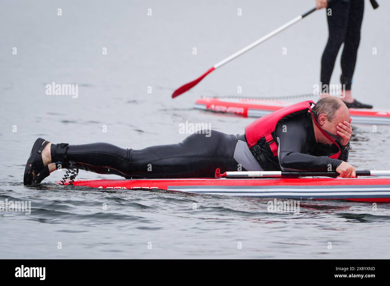 Liberal Democrat Leader Sir Ed Davey paddleboarding on Lake Windermere ...