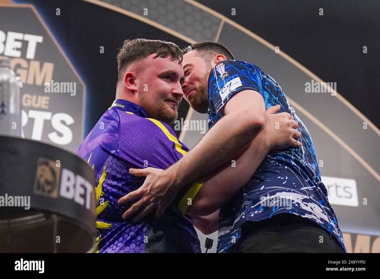 London, UK. 23rd May, 2024. Luke Littler and Luke Humphries embrace ...