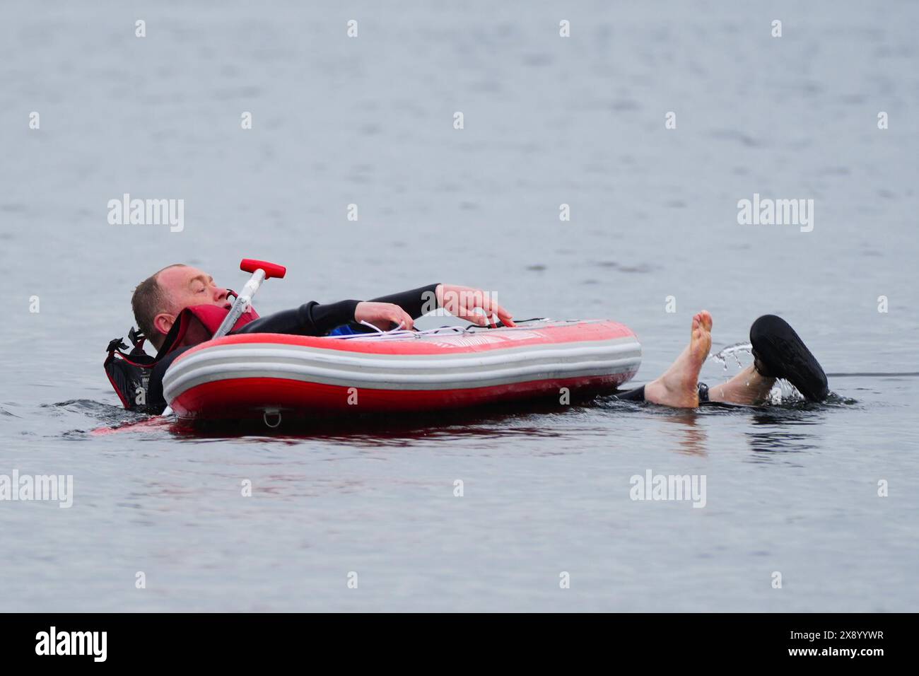 Local Liberal Democrat candidate Tim Farron paddleboarding on Lake ...