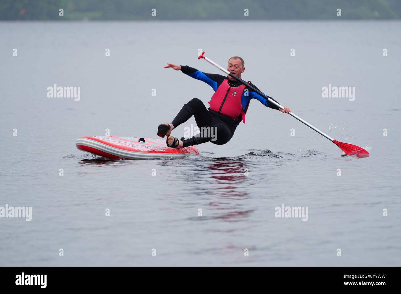 Local Liberal Democrat candidate Tim Farron falls into the water while ...