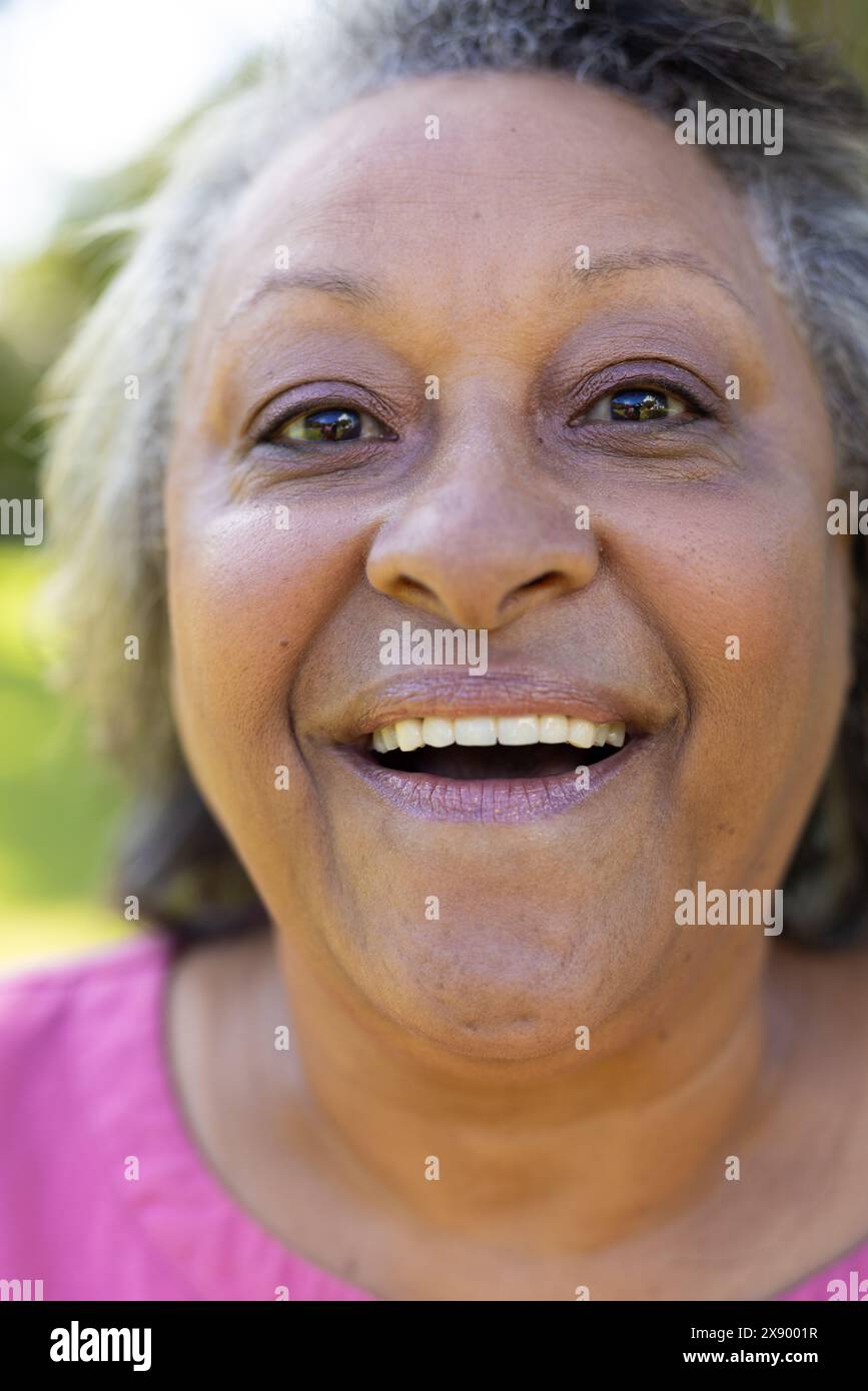 Woman wearing pink shirt hi-res stock photography and images - Alamy