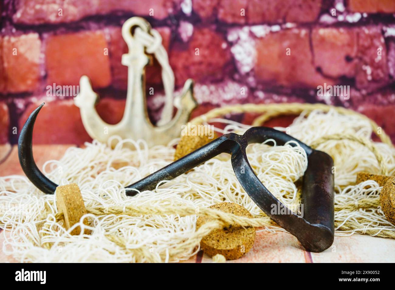 cargo hook, fishing net and anchor Stock Photo - Alamy