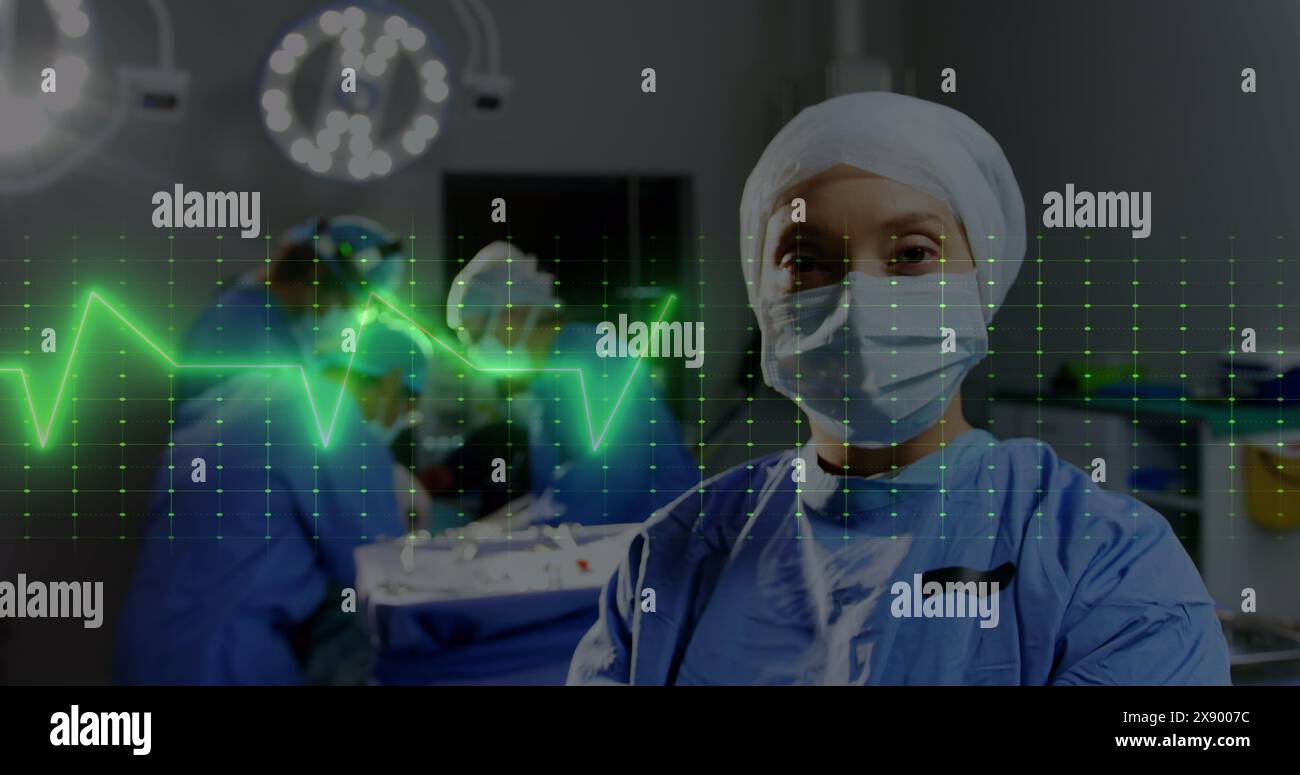 A female surgeon stands in the operating room at a hospital Stock Photo ...