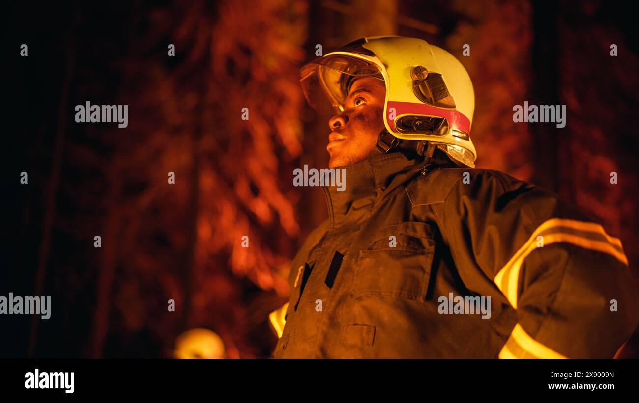 Brave Handsome Young African American Firefighter in Safety Uniform and ...