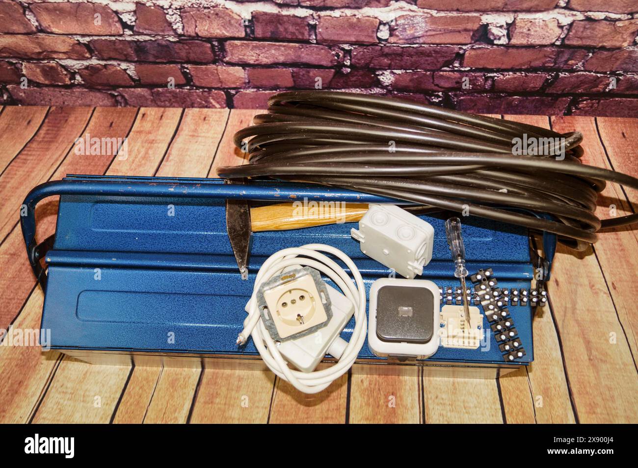toolbox with switch, socket, light bulb and power cable, symbol image ...