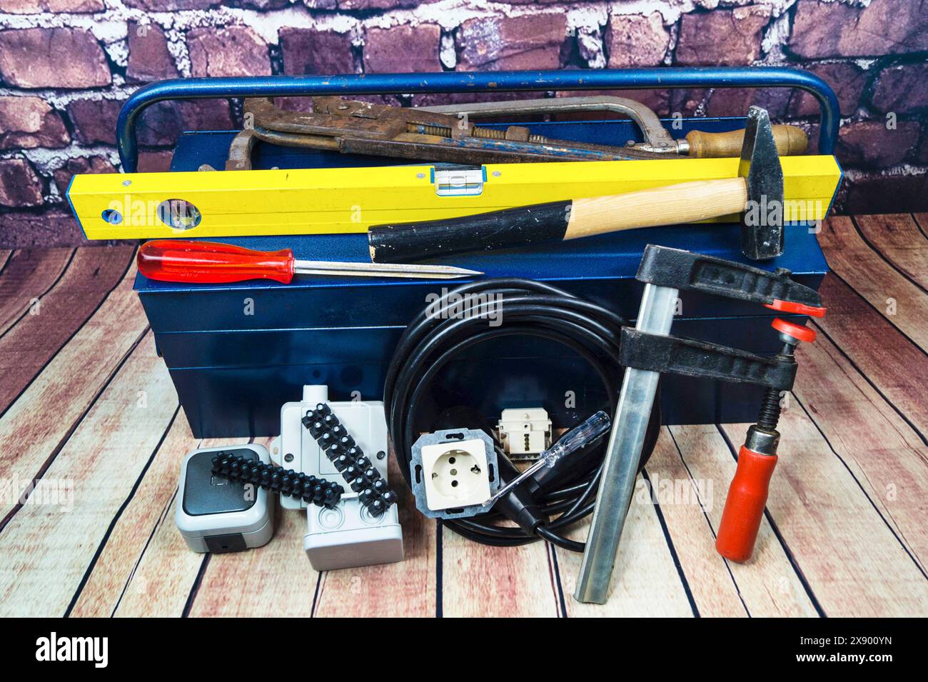 toolbox with switch, socket, light bulb and power cable, symbol image ...