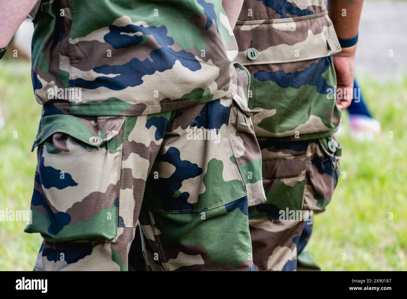 French soldier seen from behind with his equipment and camouflage ...