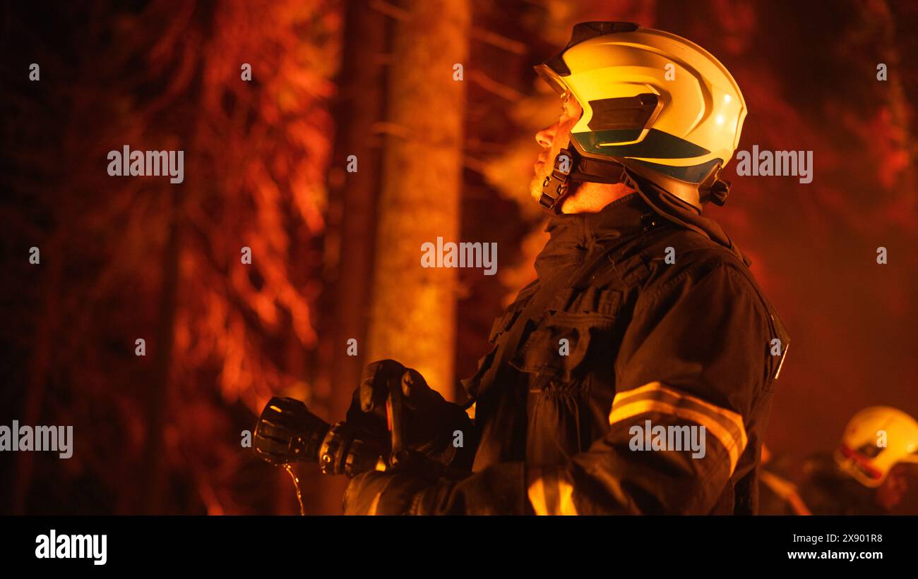 Experienced Firefighter Extinguishing a Wildland Fire Deep in the Woods ...
