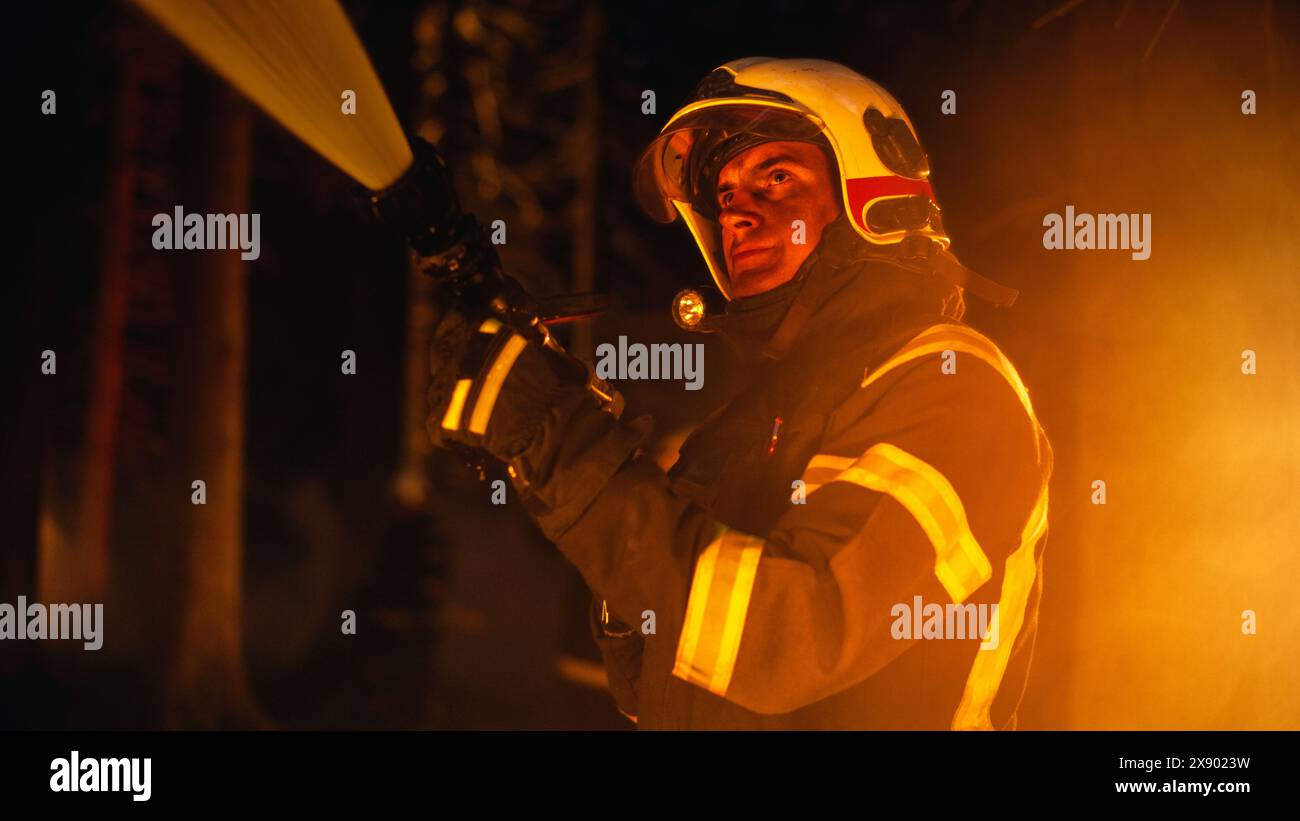 Experienced Firefighter Extinguishing a Wildland Fire Deep in a Forest ...