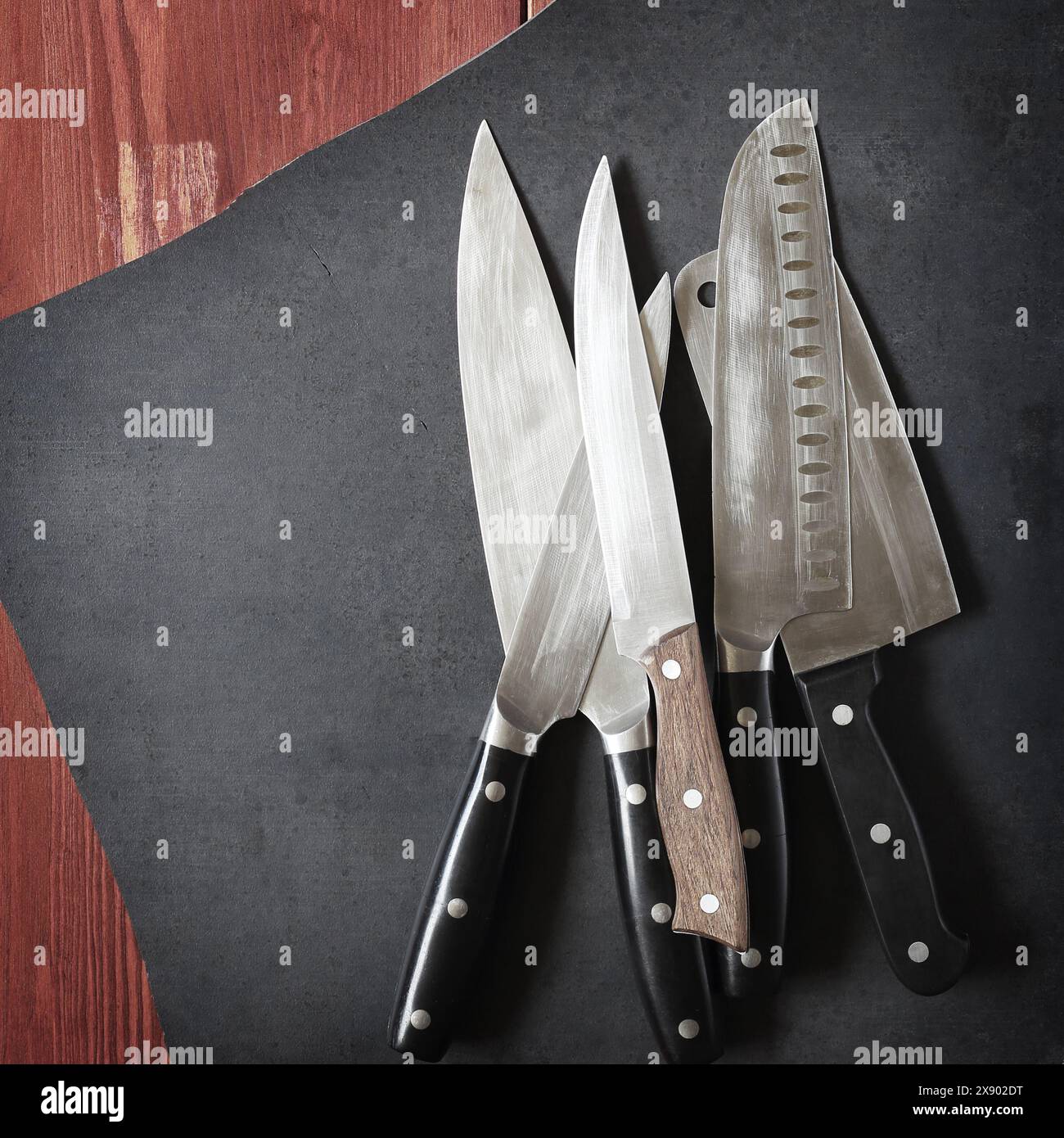 various kitchen knives on the cooking table Stock Photo - Alamy
