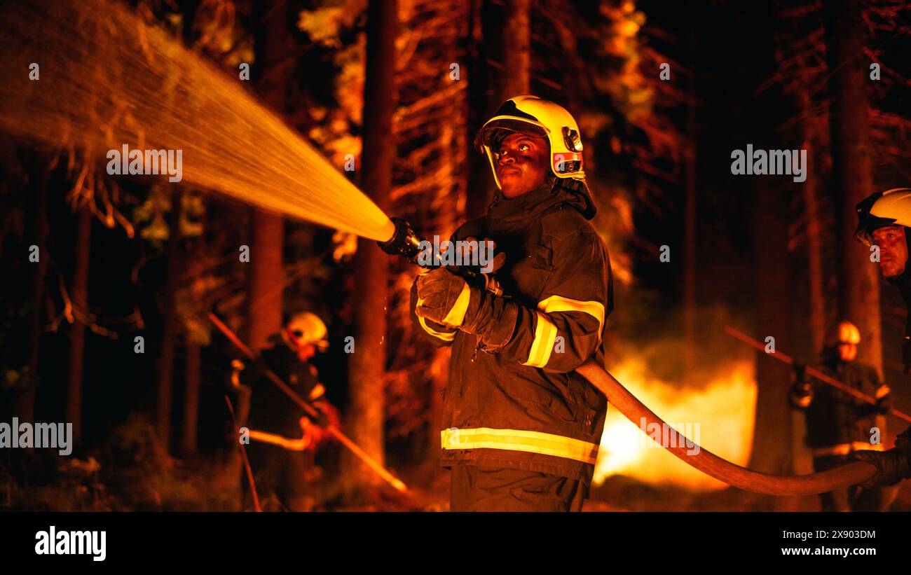 Portrait of a Handsome African American Firefighter Methodically ...