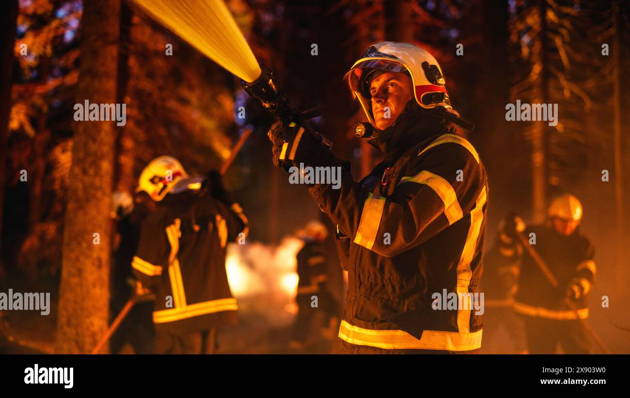 Portrait of a Handsome Caucasian Professional Firefighter Methodically ...