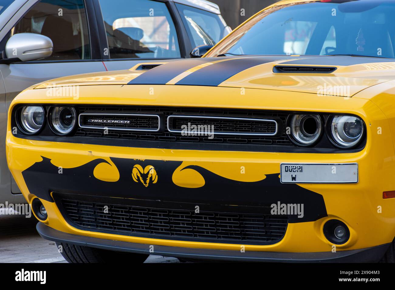Close-up of yellow Dodge Challenger in the parking in Dubai City Stock ...