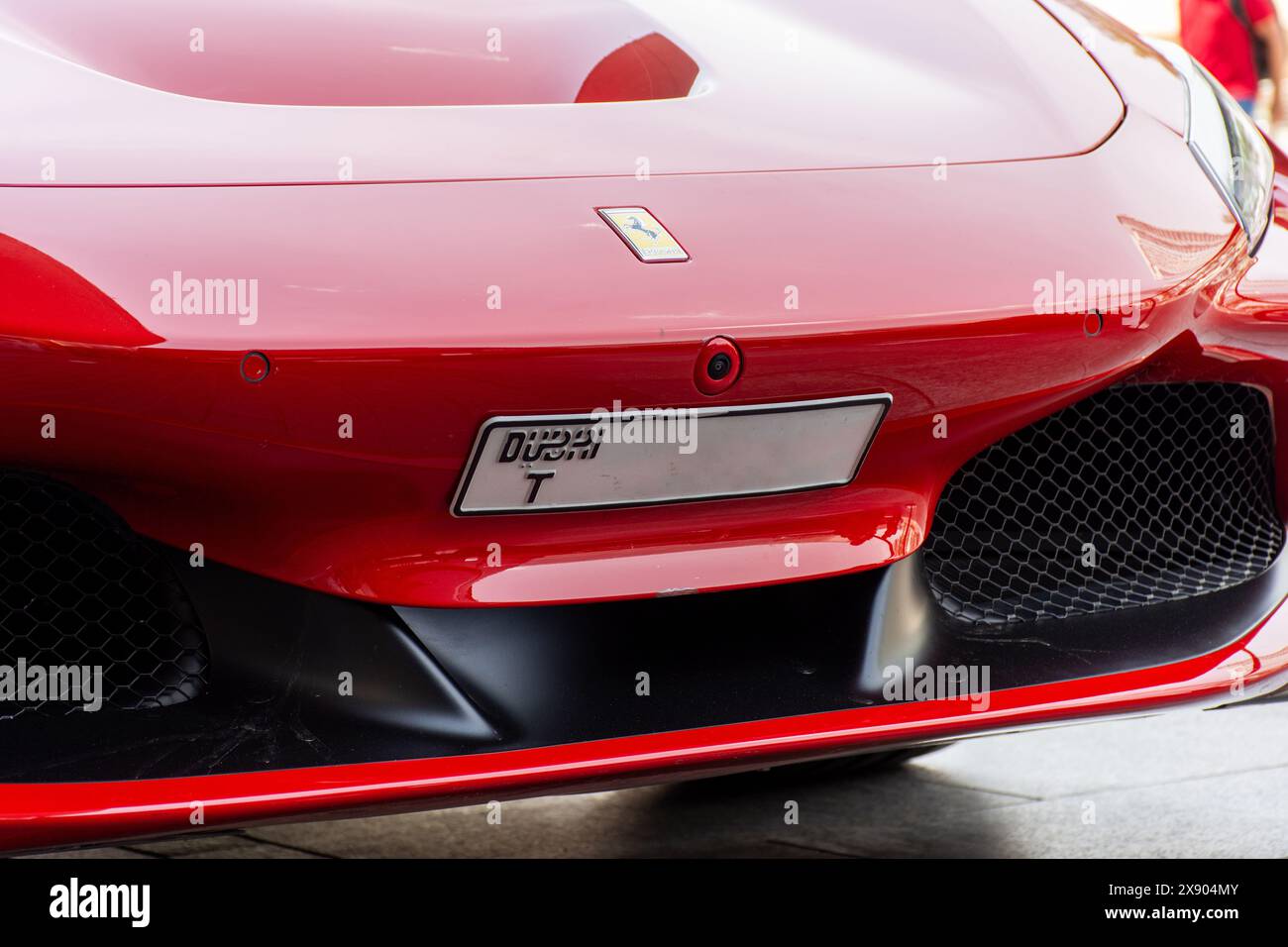 Close-up of the Ferrari logo in the front of the car Stock Photo - Alamy