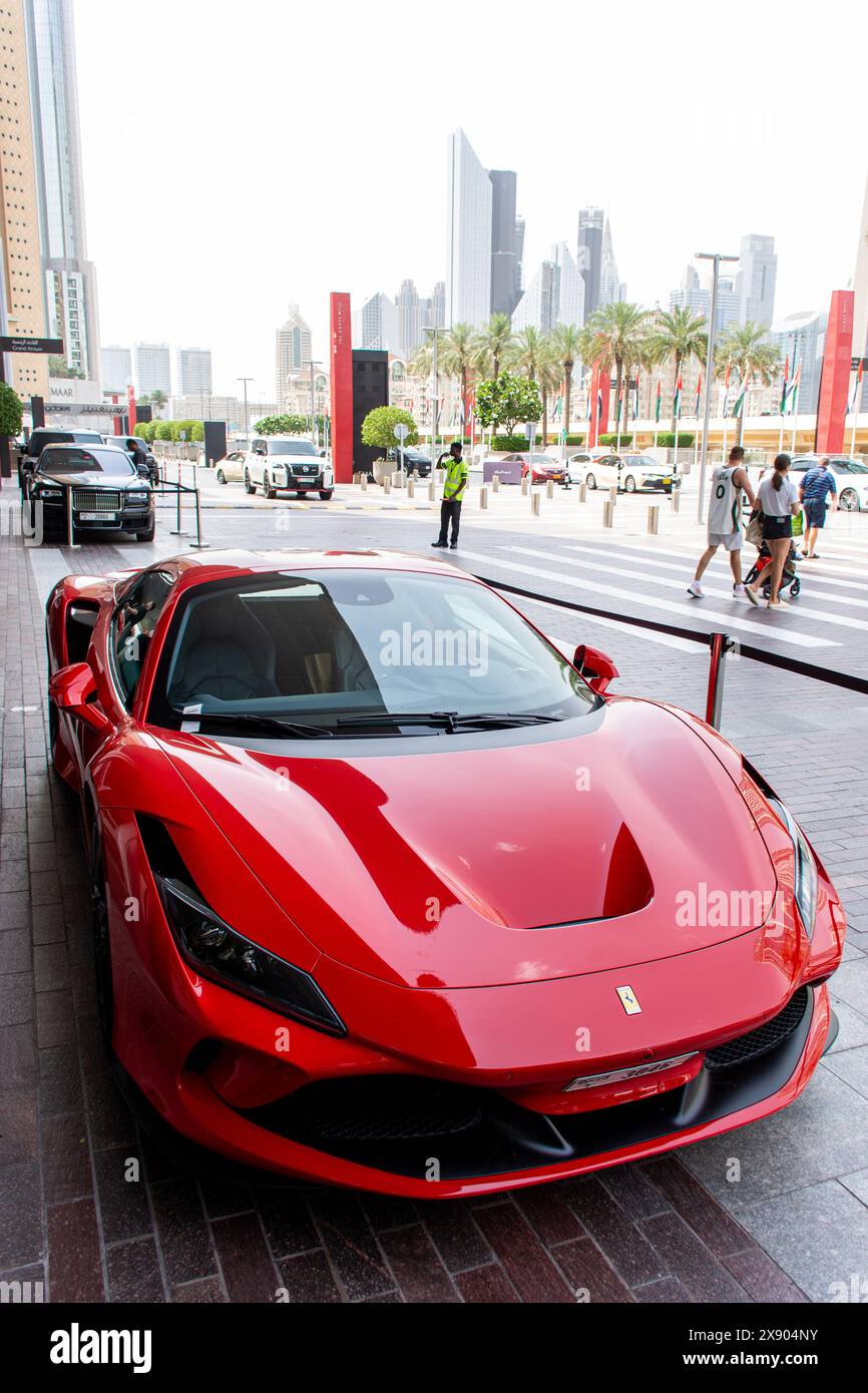 Close-up of red Ferrari F8 Tributo parked in Dubai Mall Stock Photo - Alamy