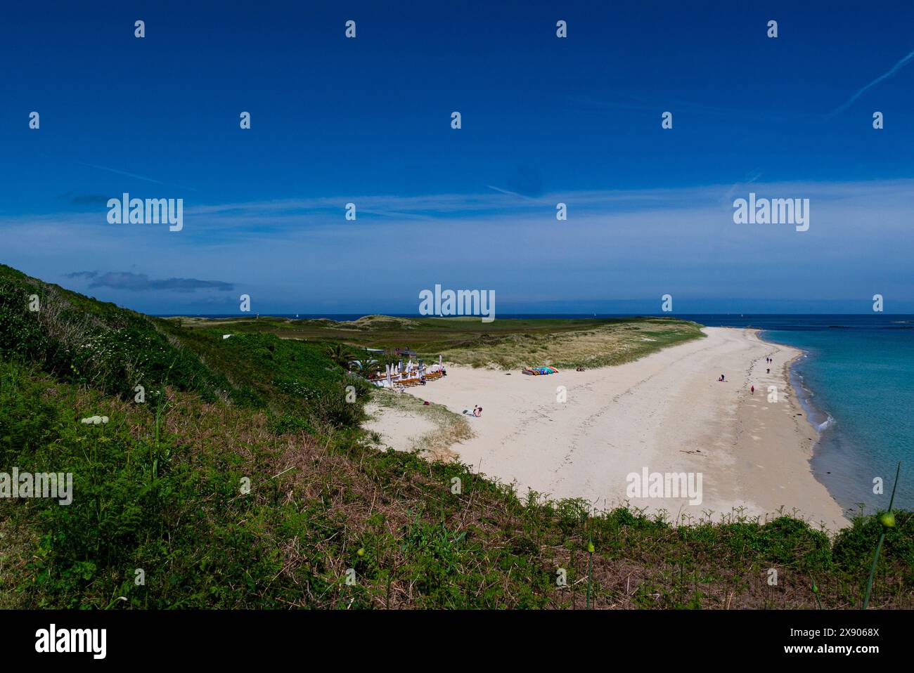 Looking down on white sandy Shell beach from Herm Island coastal path ...