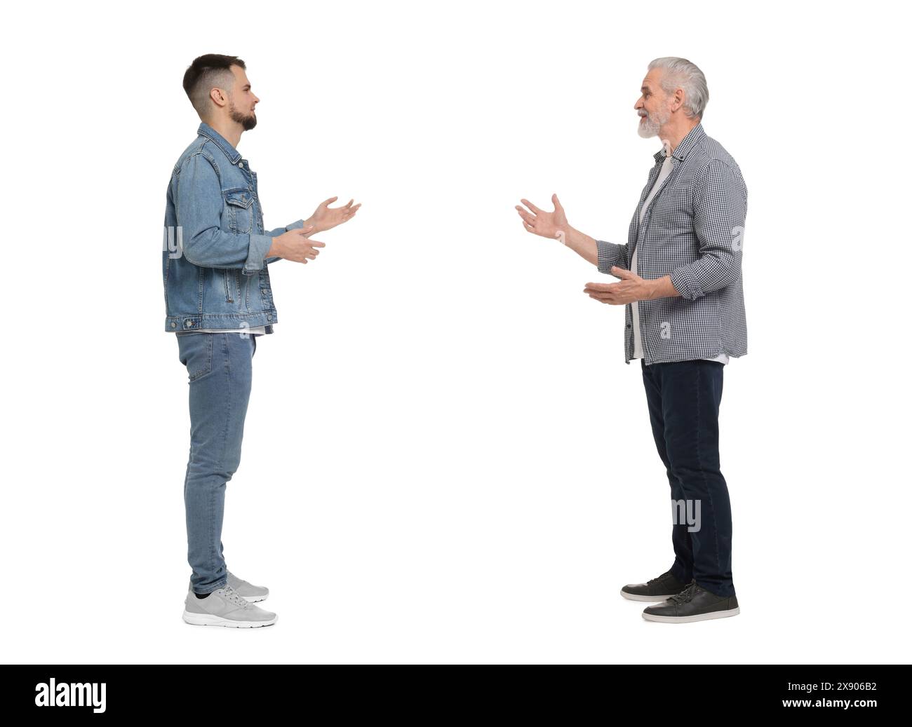 Two men talking on white background. Dialogue Stock Photo - Alamy