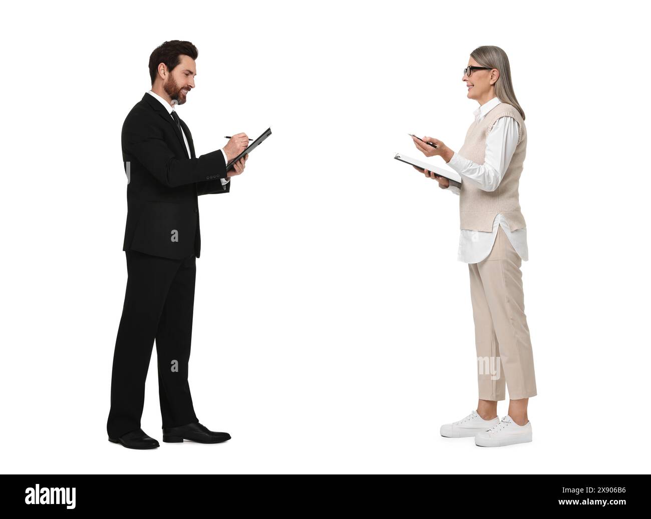 Two business people talking on white background. Dialogue Stock Photo ...