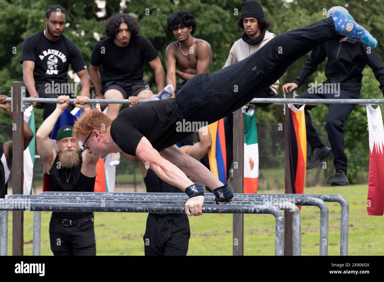 Young calisthenics athletes perform feats of physical strength and ...
