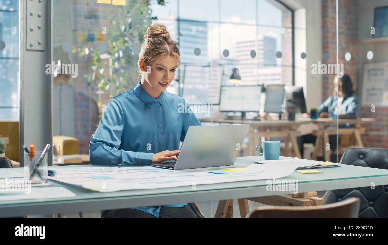 Portrait of Beautiful Caucasian Woman Working on Laptop Computer at a ...