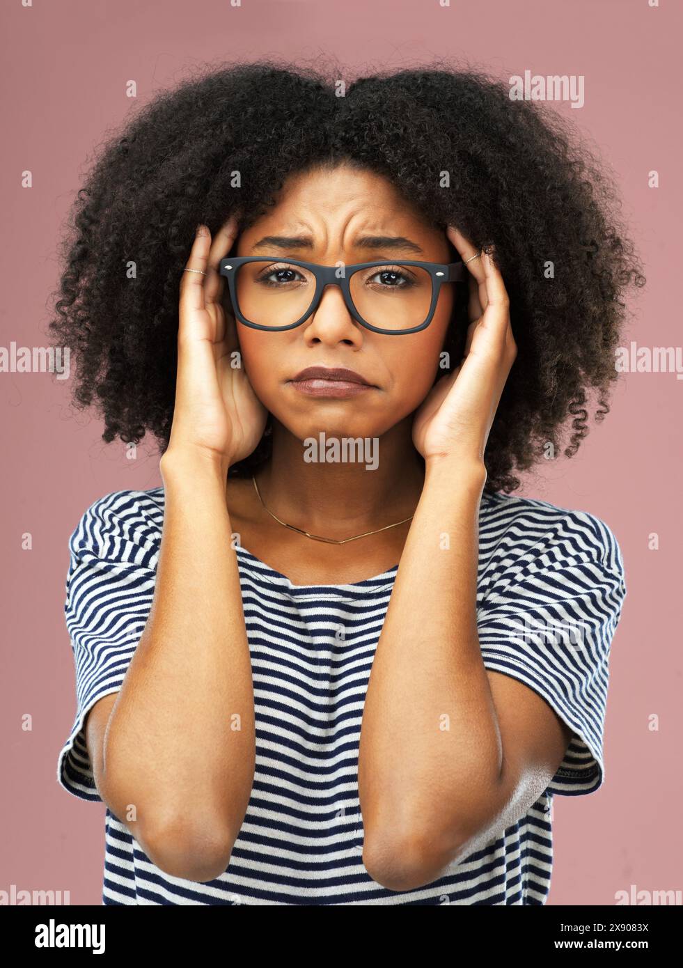 Stress, headache or woman face with glasses in studio overwhelmed by ...
