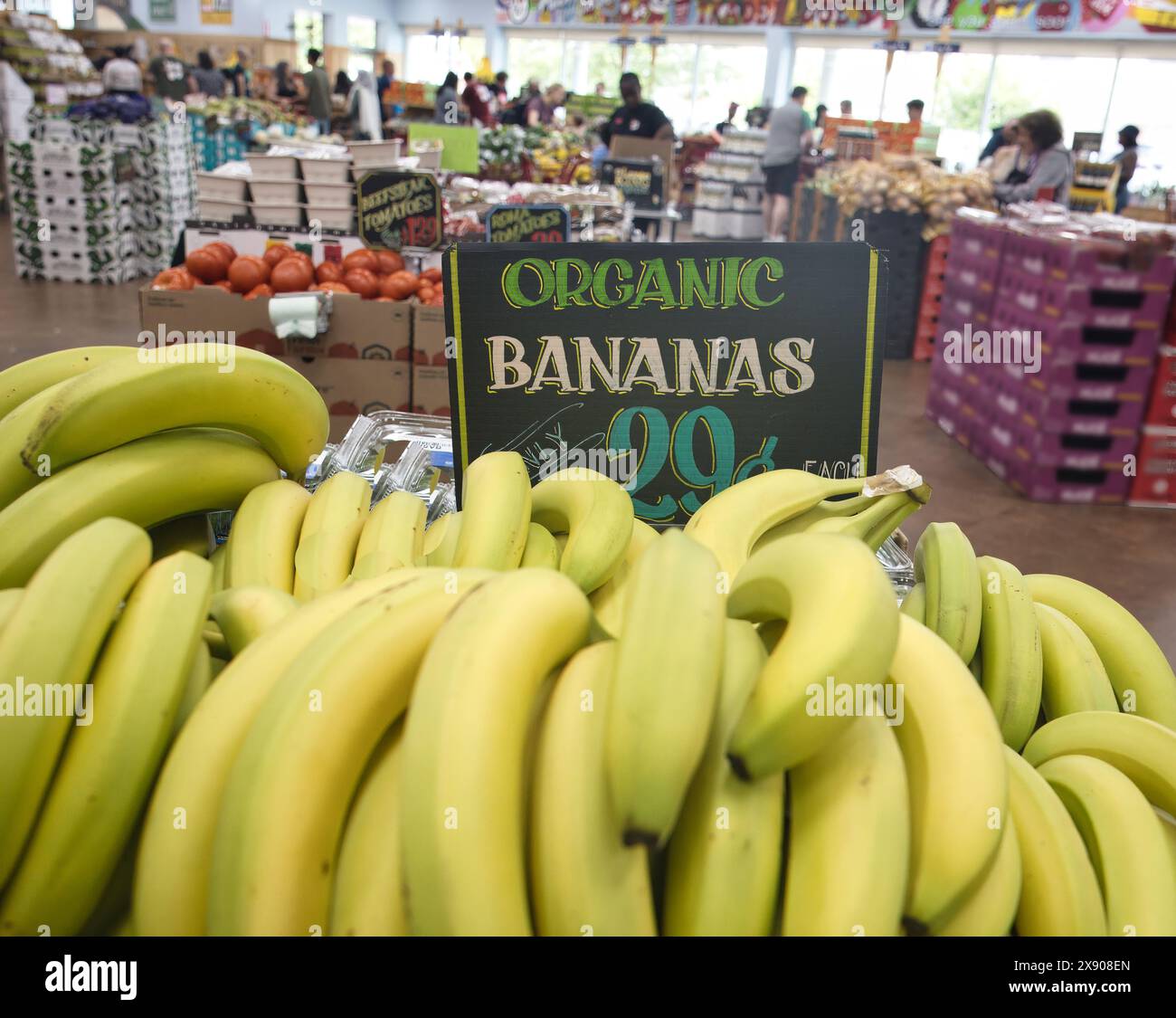 Organic Bananas on display in supermarket Stock Photo - Alamy