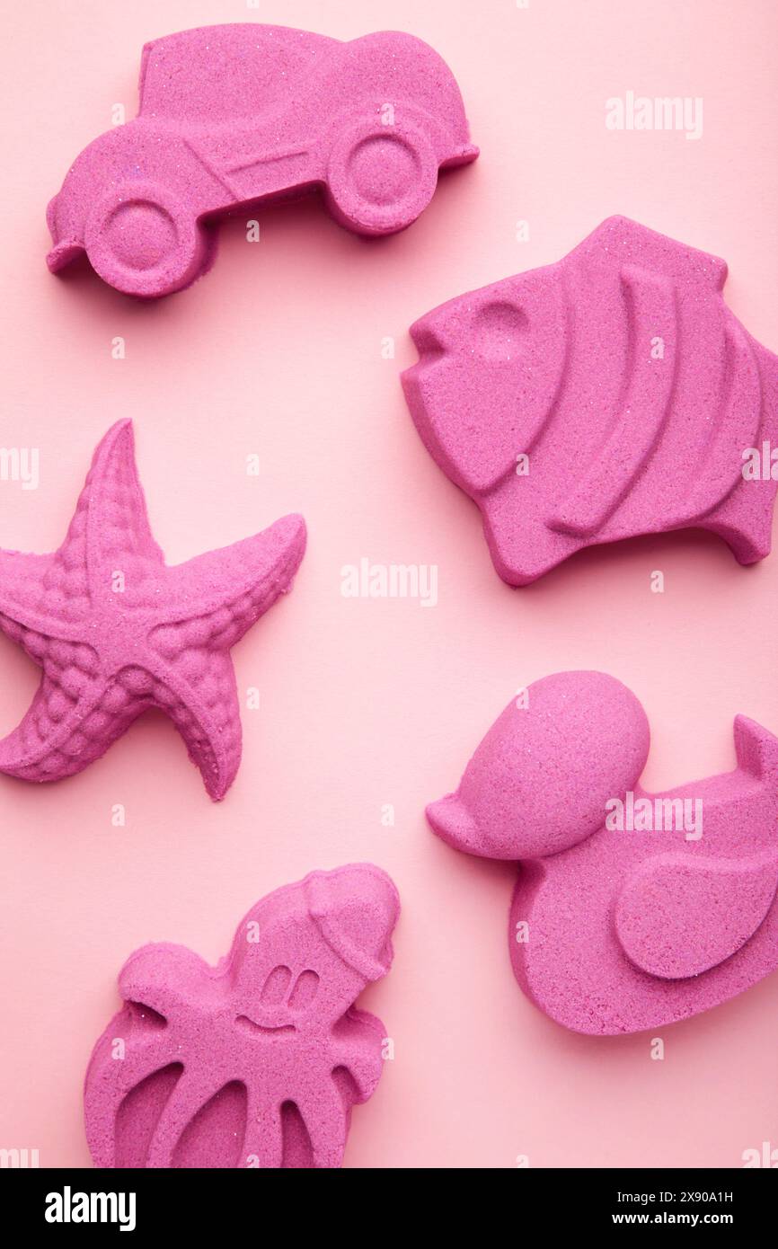 Pink kinetic sand for children, development and play at home with multi ...