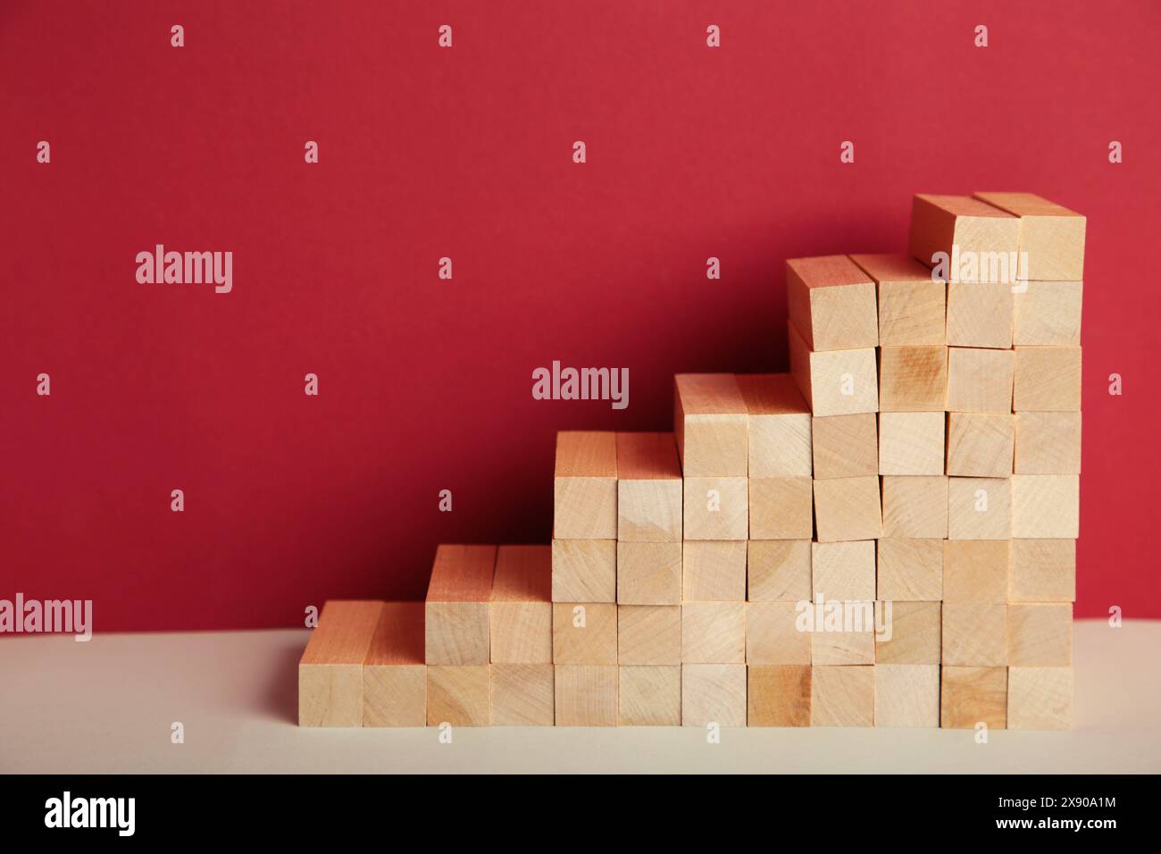 Stairway of wood blocks on red background. Business concept. Top view ...