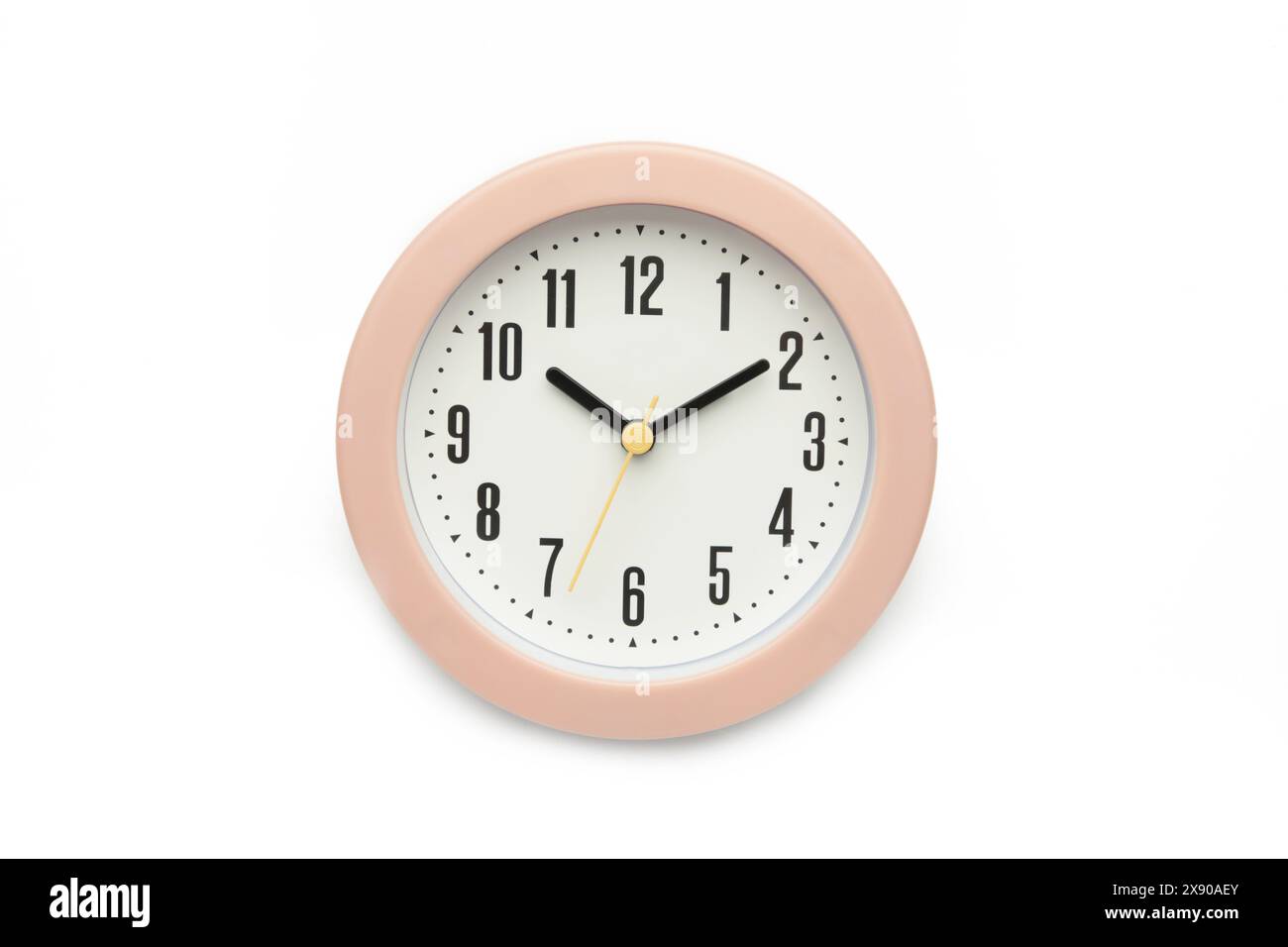 Pink clock isolated over white background close-up with clipping path ...