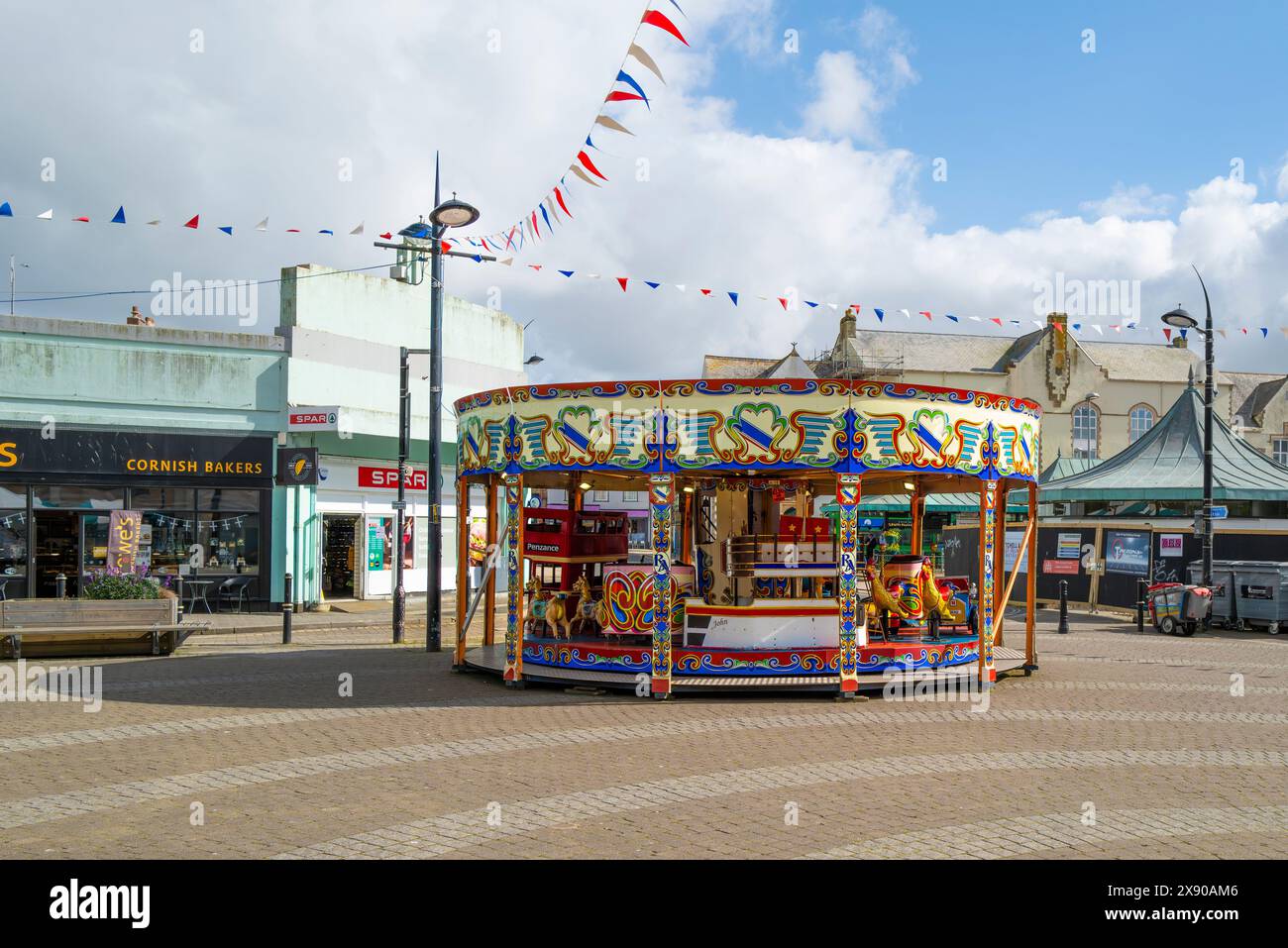 A colourful colorful childrens carousel on Lemon Quay in Truro city ...