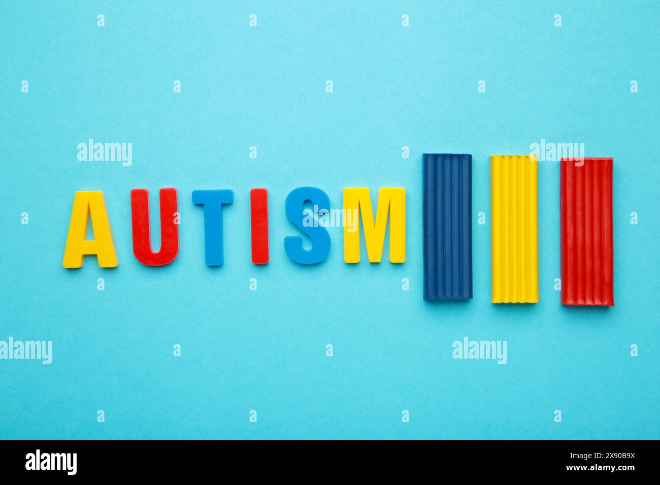Autism. Autism spectrum disorder. Autism word made with playdough on ...