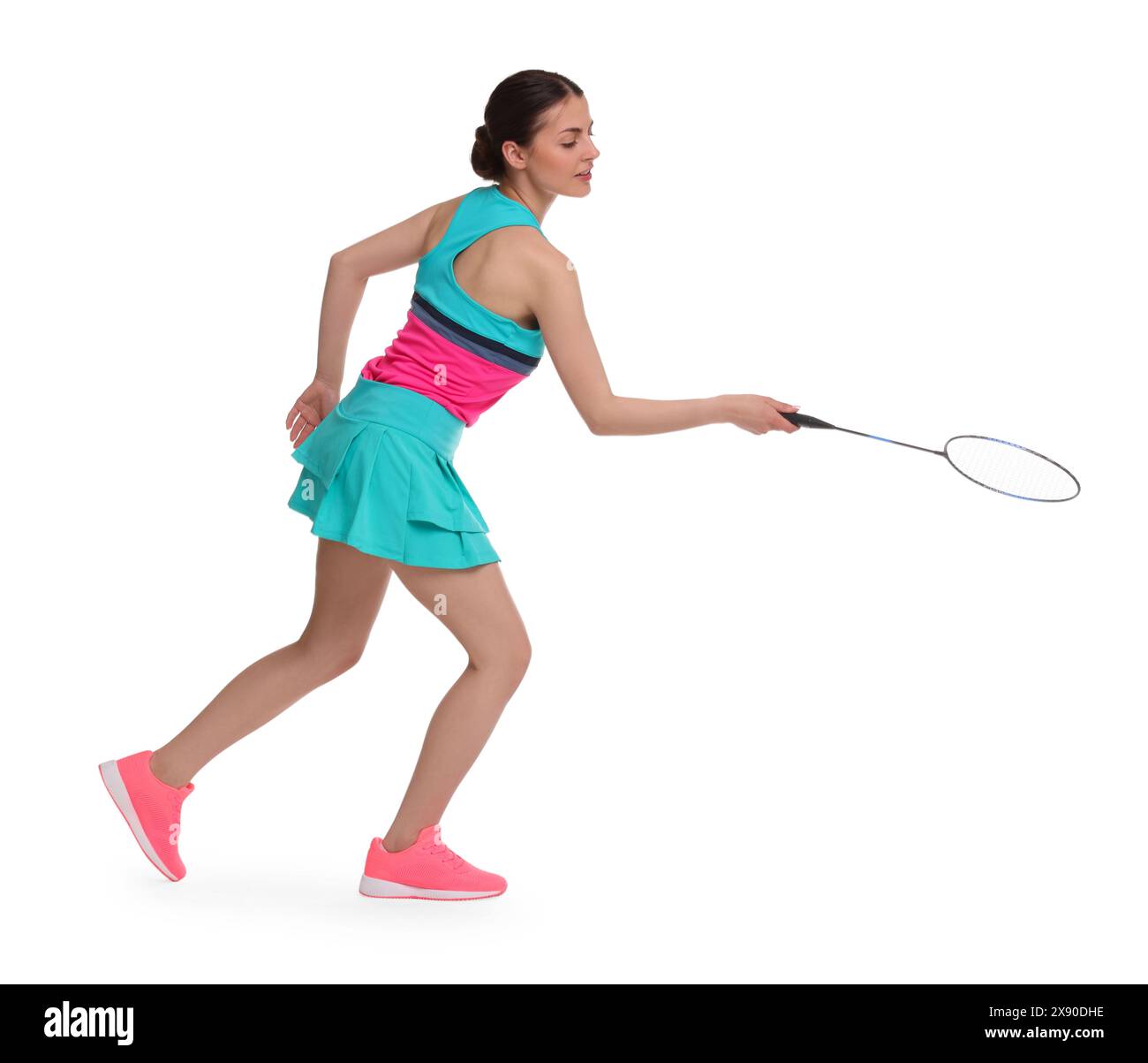 Young woman playing badminton with racket on white background Stock ...