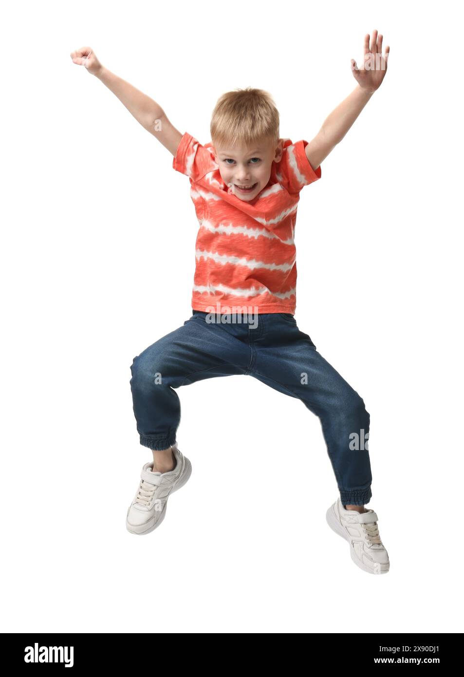 Happy little boy dancing on white background Stock Photo - Alamy