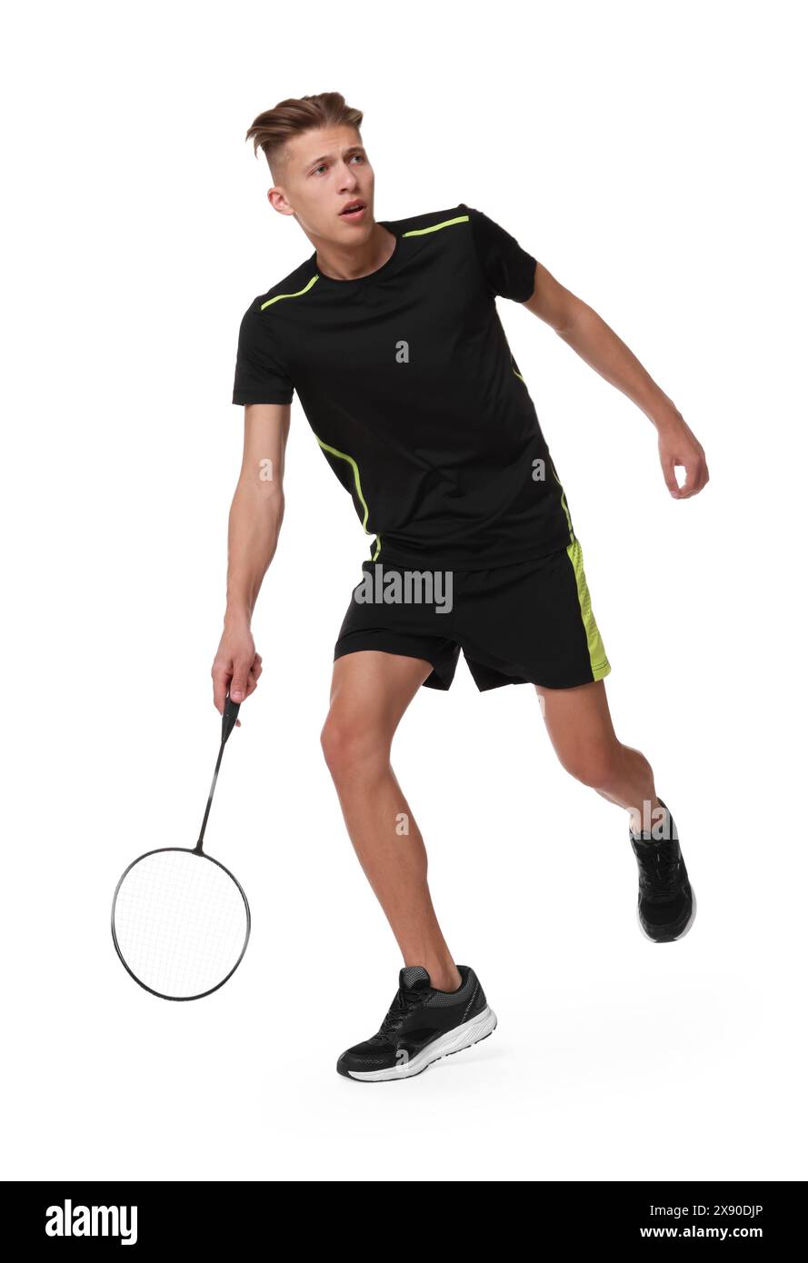 Young man playing badminton with racket on white background Stock Photo ...