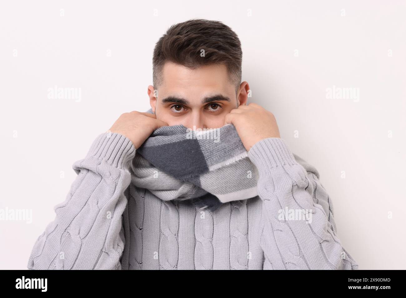 Man hiding in warm hi-res stock photography and images - Alamy