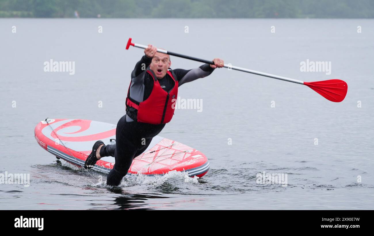 Liberal Democrat Leader Sir Ed Davey falls into the water while ...