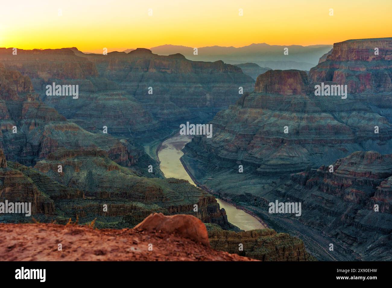 Breathtaking view of the Grand Canyon's winding river, beautifully lit ...