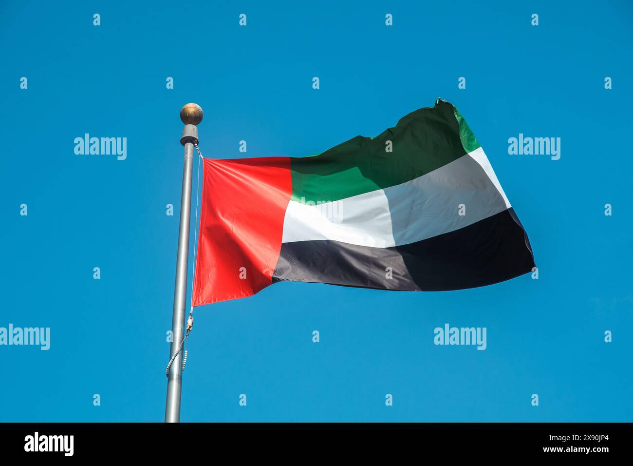 Dubai, UAE - January 6, 2024: The United Arab Emirates flag waves ...