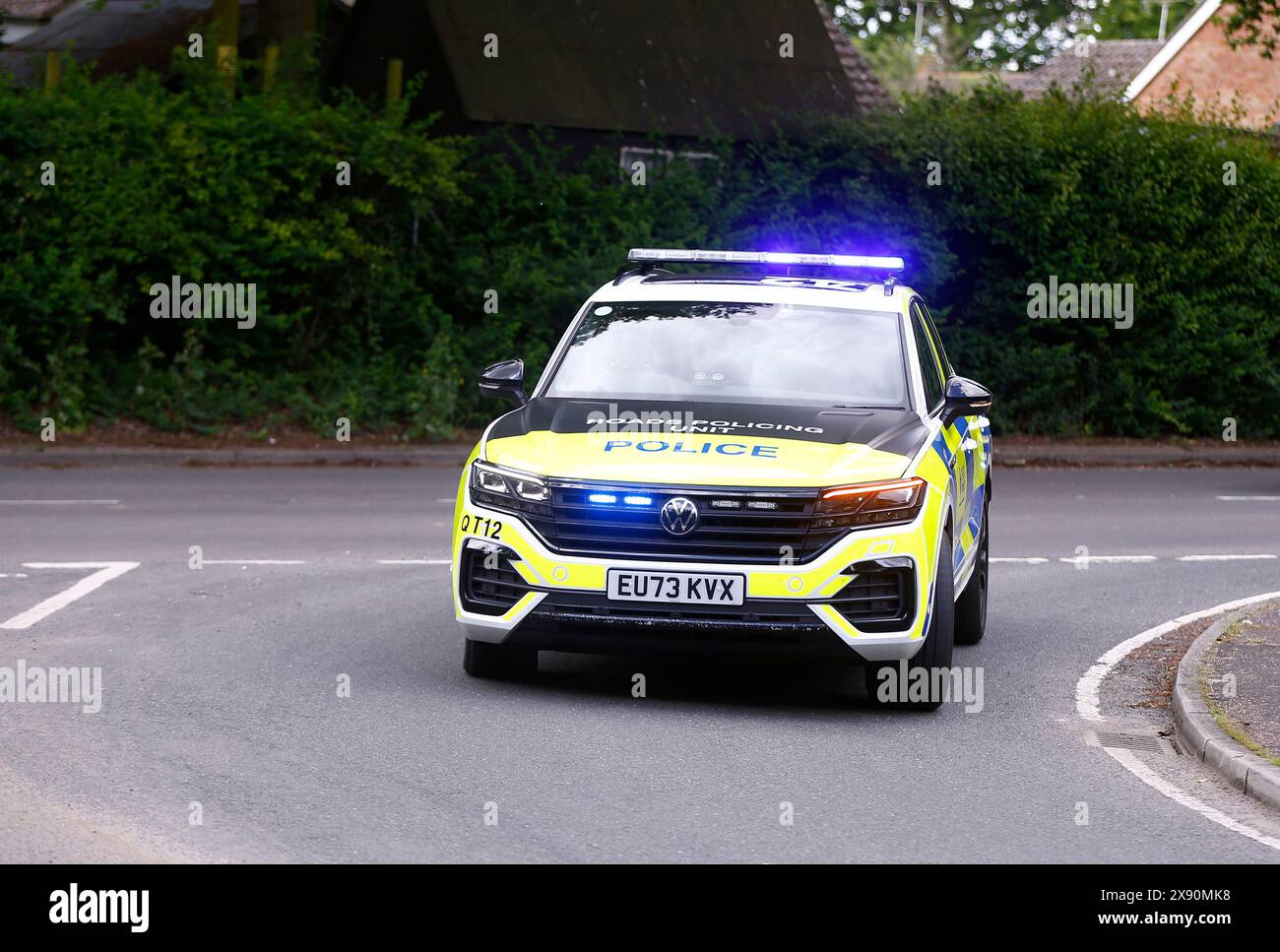 Blue and yellow police vehicle hi-res stock photography and images - Alamy