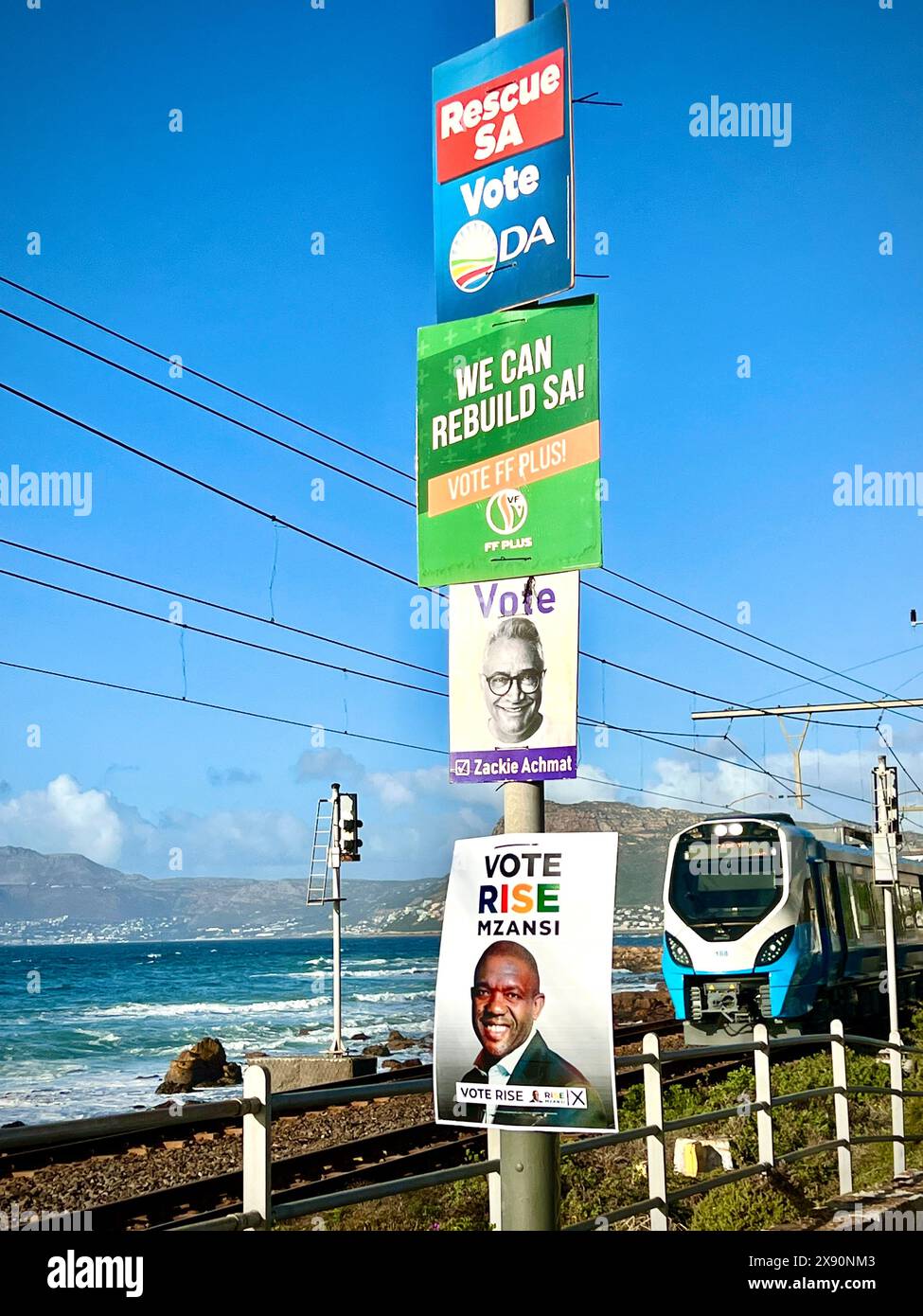 Cape Town, Kalk Bay mainroad. Election posters for various political ...