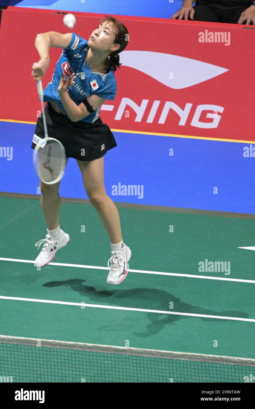 Singapore. 28th May, 2024. Okuhara Nozomi of Japan hits a return during the women's singles ...