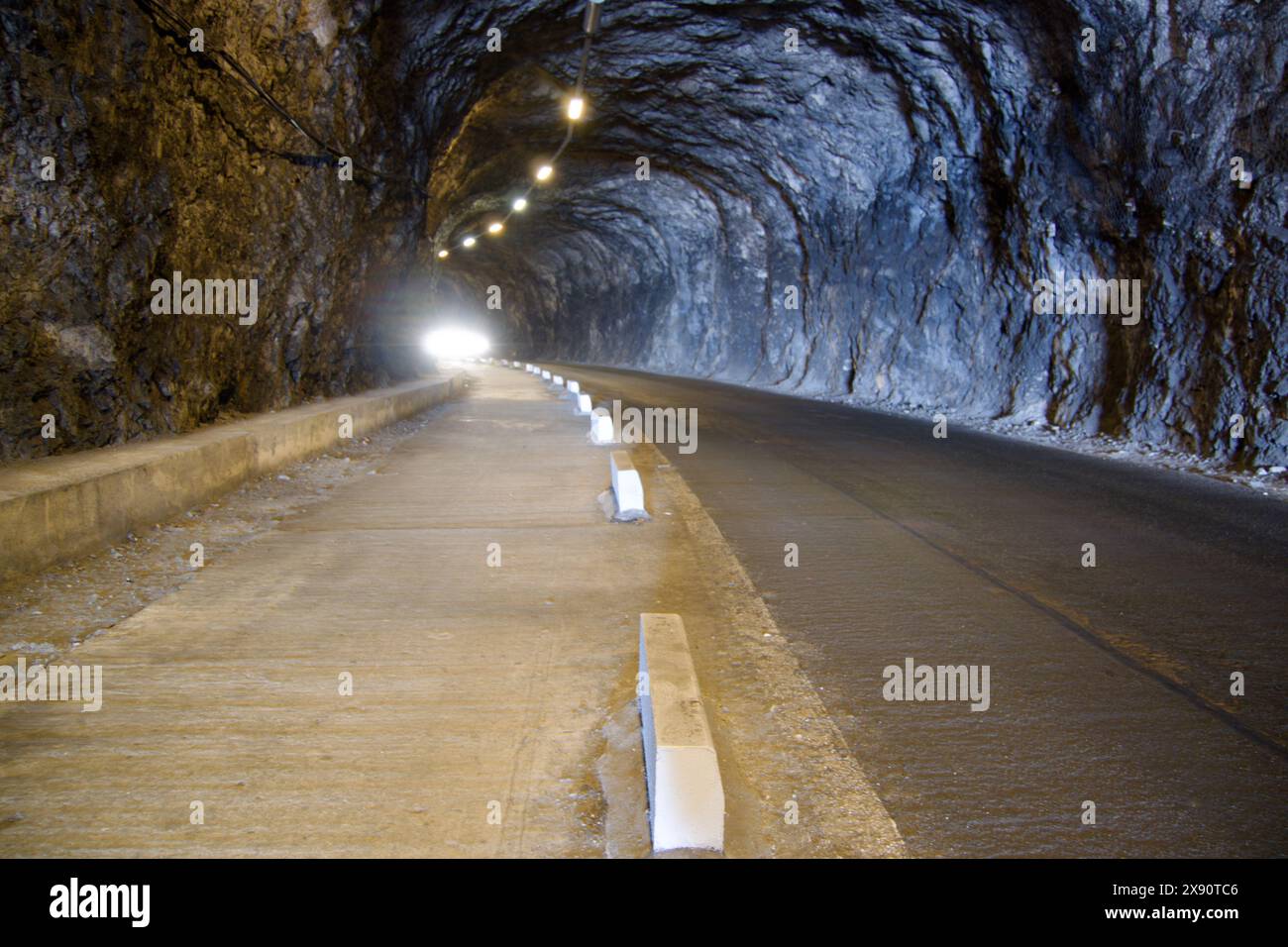 Headlights in Keightley Way road tunnel through the Rock of Gibraltar ...