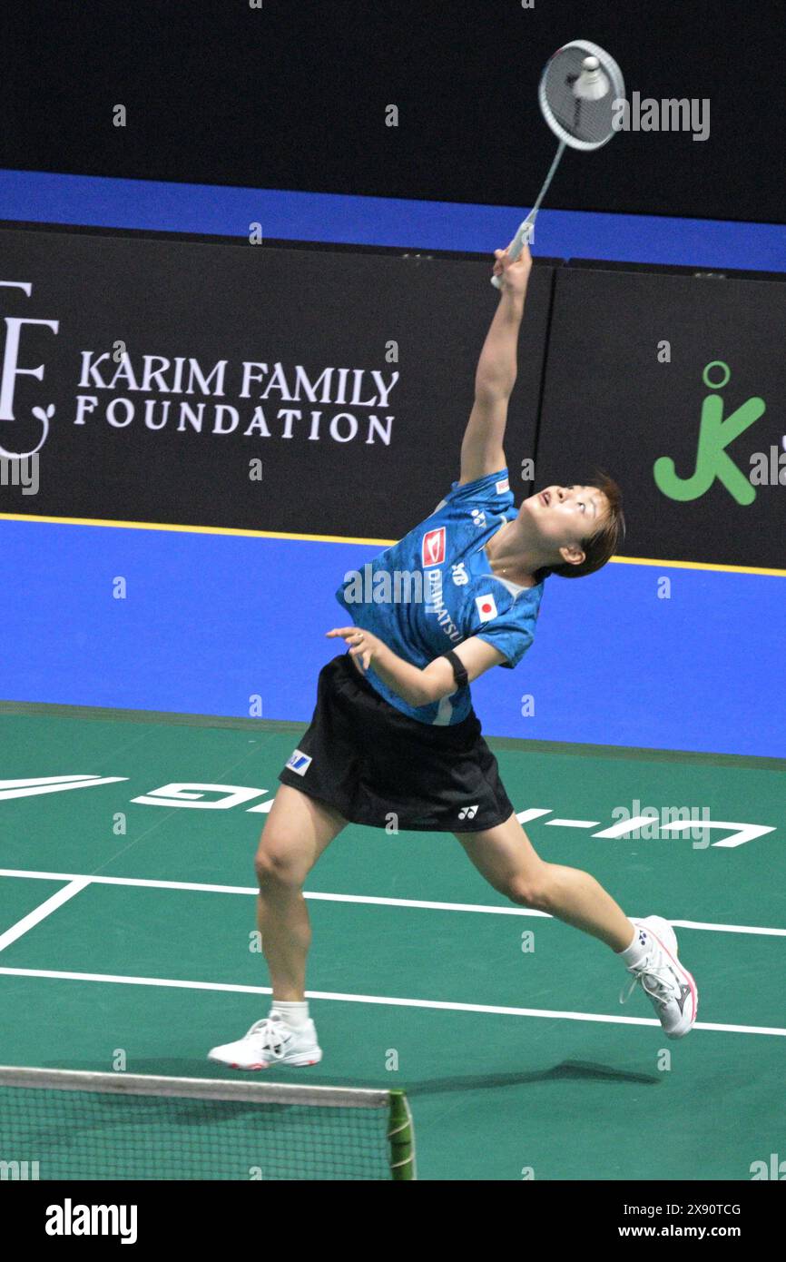 Singapore. 28th May, 2024. Okuhara Nozomi of Japan hits a return during the women's singles ...