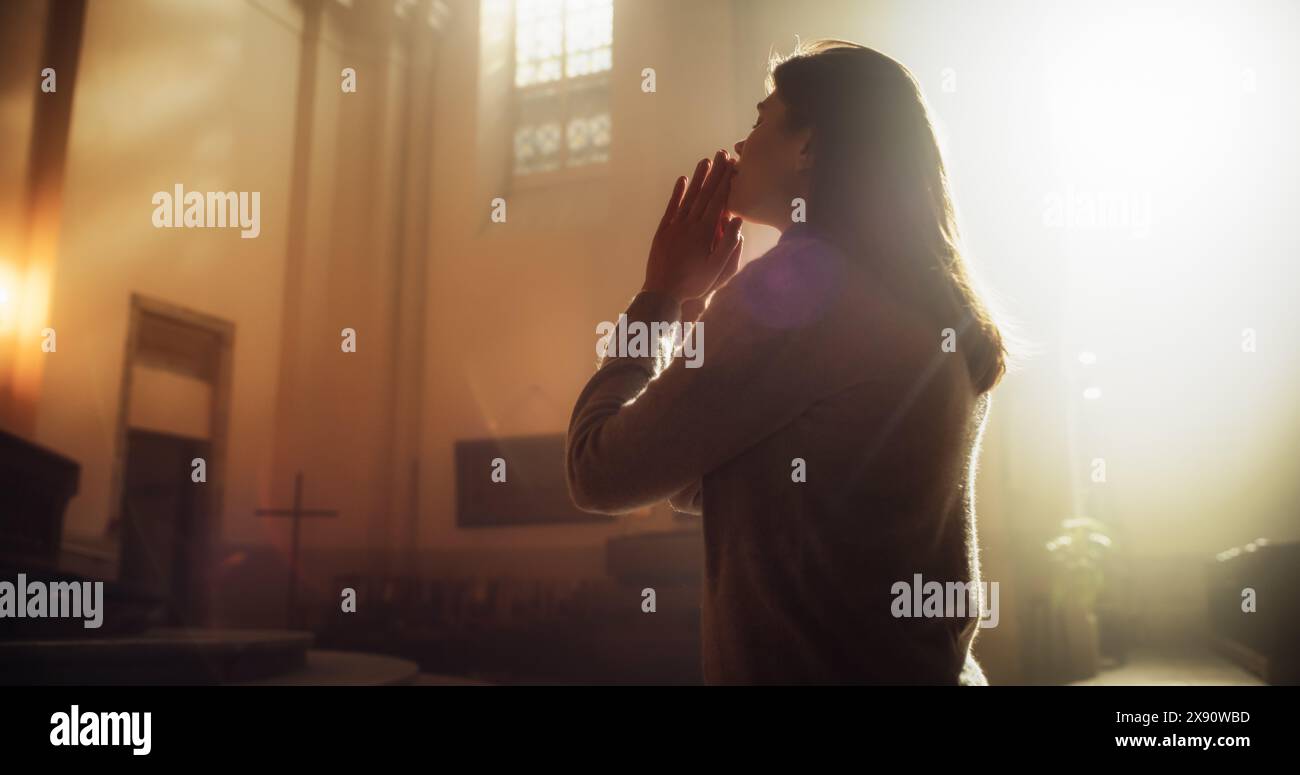 Side View: Christian Woman Getting on her Knees in Front of Altar and ...